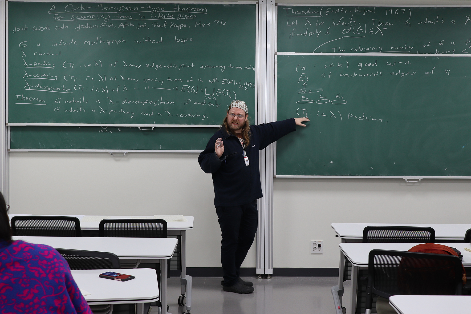 Pascal Gollin gave a talk on the existence of a decomposition of an ...