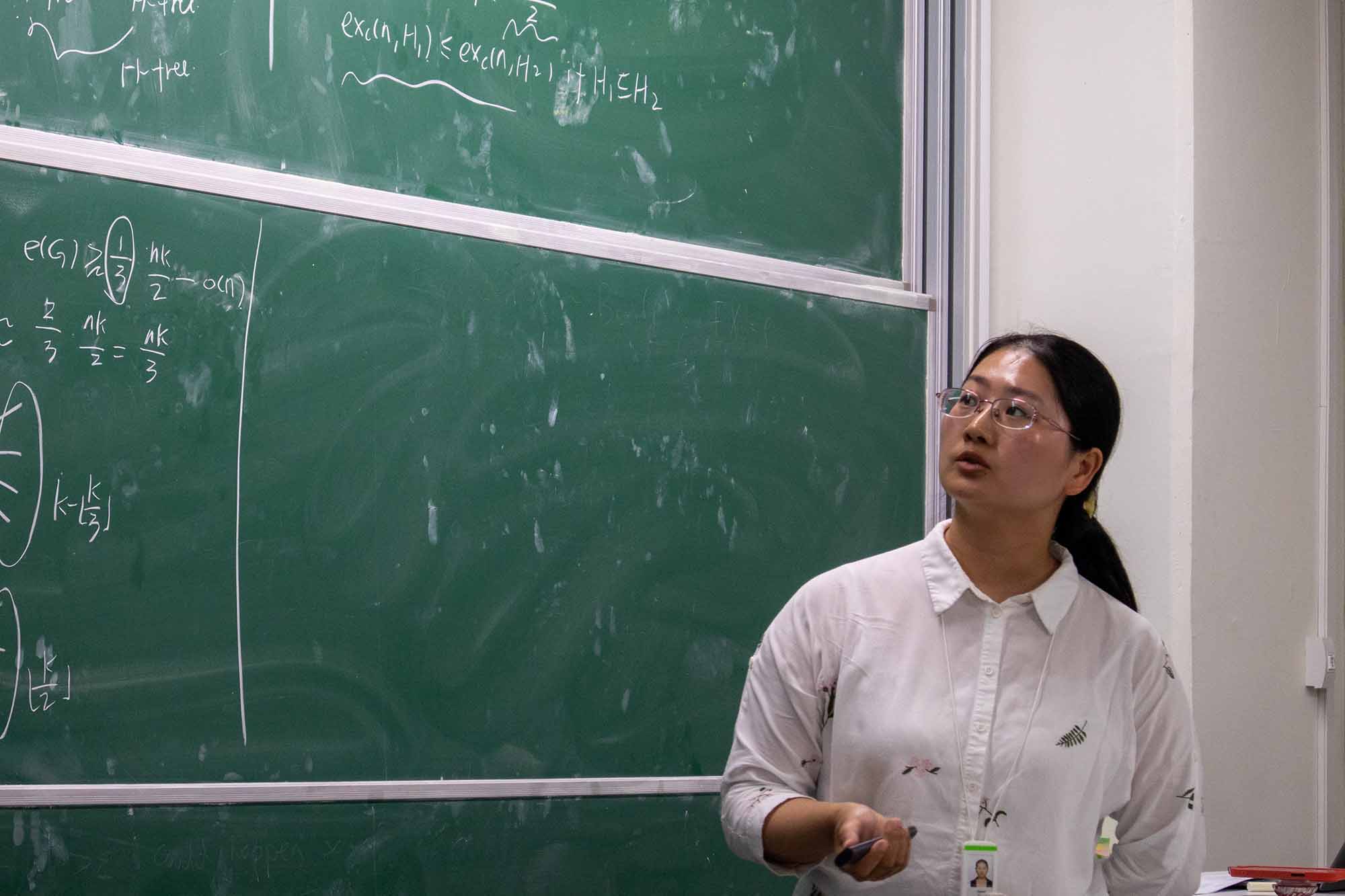 Suyun Jiang (江素云) gave a talk on the maximum number of edges in a ...